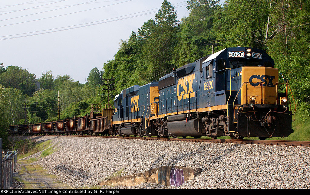 405 - Westbound rail train with relay rail passes the hydro plant